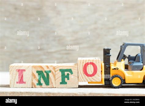 Toy Forklift Hold Letter Block O To Complete Word Info On Wood