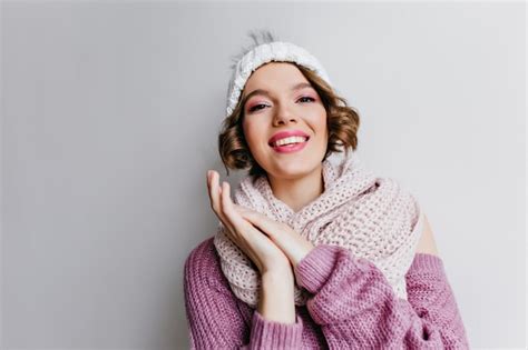 Free Photo Winsome Girl With Pink Makeup Posing In Knitted Winter