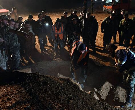 Isis Mass Grave With Hundreds Of Corpses Excavated Near Raqqa Daily