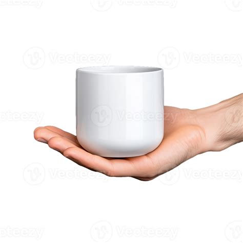 A Simple White Ceramic Mug Being Held In A Human Hand Isolated On