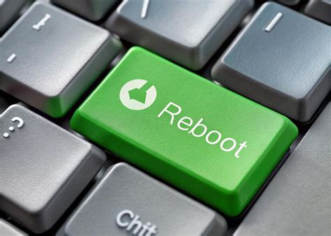 Keyboard Reboot Button Representing The Concept Of Restarting Refreshing And Rebooting Systems