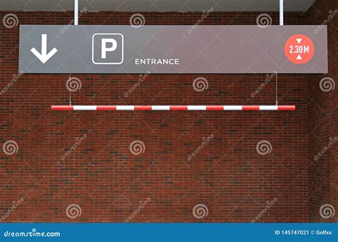 Car Park Entrance To A Parking Lot With Signs Arrow And Height Limit 2