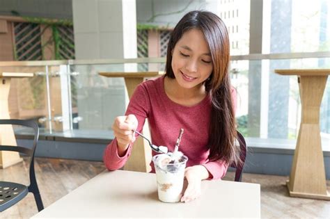 Premium Photo Happy Girl Eating Ice Cream