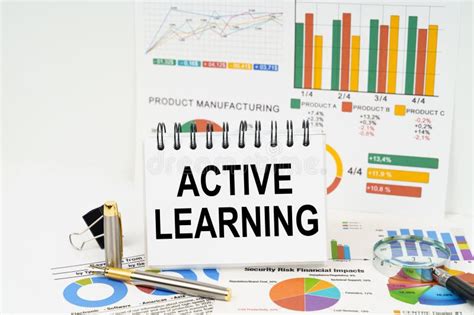 on the table are reports with graphs and a notepad with the inscription