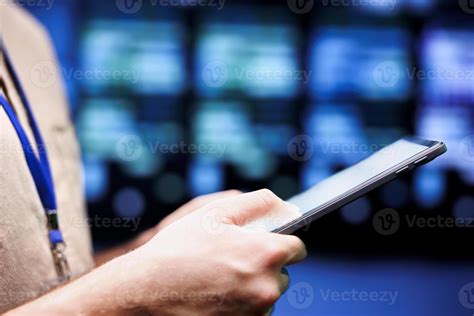 Close Up Shot Of Computer Scientist Using Tablet To Check Server Hub Security Features