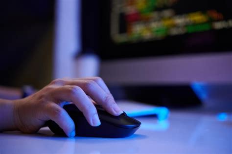 Premium Photo Using Computer Mouse During Software Programming Session