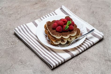 Premium Photo Classic Tiramisu Dessert With Berries