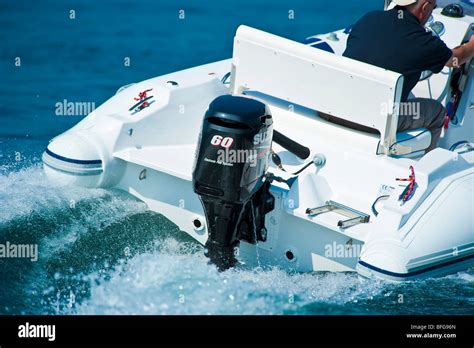 New 2009 Model Of Suzuki Df 60 Outboard Engine On Power Boat Transom