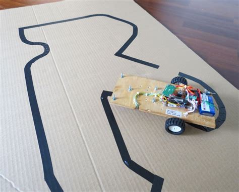 Inlinea01 A Pid Controlled Line Following Robot Build On An Atmega 8