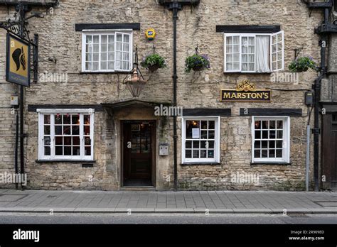 Old Stone House With Pub In Detail In The Old Town Of Cirencester