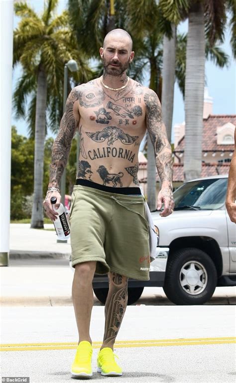 Adam Levine Goes Shirtless As He S Joined By Personal Trainer And