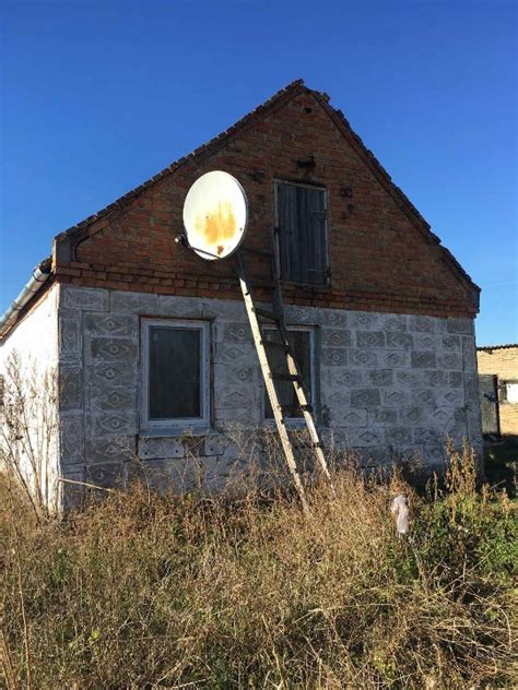 Житловий будинок загальною площею 33 7 кв м з господарськими будівлями та спорудами за