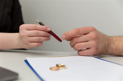 Premium Photo Prenuptial Agreement Concept Man And Woman Signing Notary Document Together