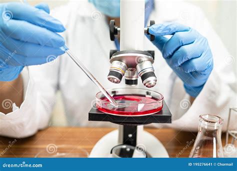 Microbiologist Who Is Working With Blood Tube Test In The Microbiology