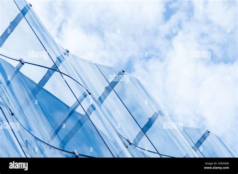 Detail Of The Wavy Glass Curtain Wall Facade Of A Nice Modern Building