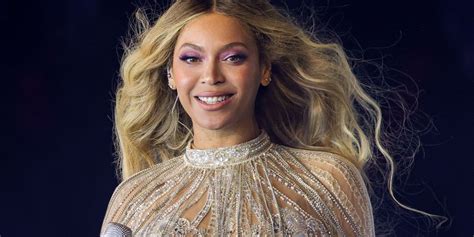 Beyoncé Poses In Sheer Pink Corset Gown With Feathered Stole