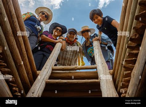Visitors Descent Into A Sacred Kiva At The Pecos National Hisorical