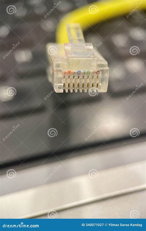 Ethernet Cable Close Up A Close Up Photo Of An Ethernet Cable Connector Showcasing The Eight