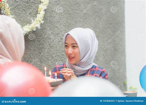 Attractive Hijab Woman Having Surprise Birthday Cake From Her