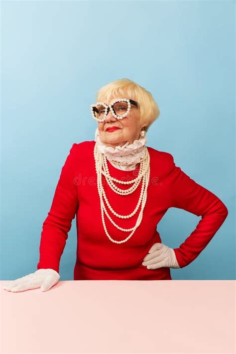 High Fashion Beautiful Old Woman Grandmother In Stylish Red Dress And