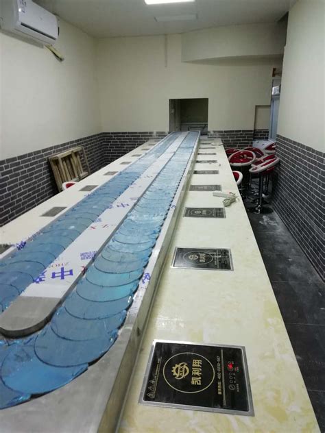 都用心去解答，用心去解决旋转小火锅设备无烟涮烤一体设备回转小火锅设备旋转寿司设备转转小火锅设备智能餐饮设备青岛凯利翔机械设备有限公司