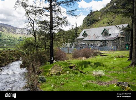 Small Cwm Dyli Hydro Electric Power Station And Afon Glaslyn River In Snowdonia National Park