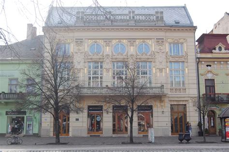 Front View Of Beautiful Old Stone Building At Urban Street Editorial