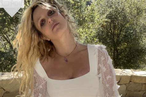 Britney Spears Wows As She Showcases Washboard Abs In Tiny Crop For