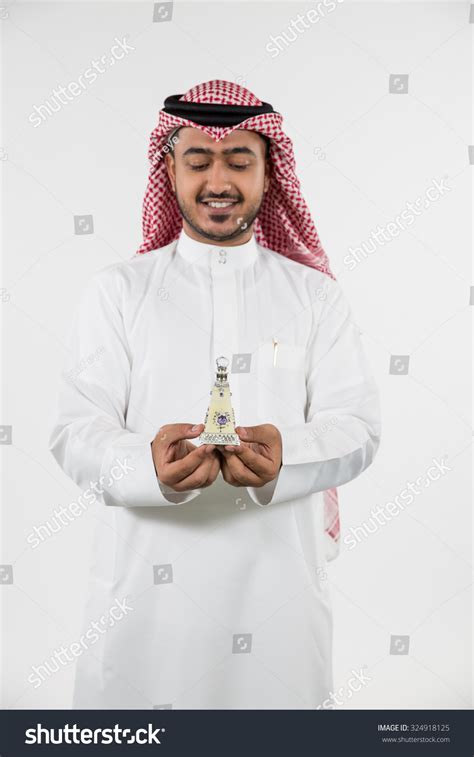 Man Holding A Perfume Front Over 53 Royalty Free Licensable Stock