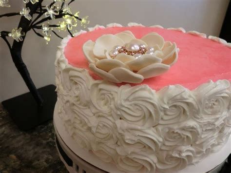 Yellow Rosettes Cake With Glittery Gold Dust