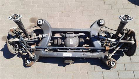 Oś belka sanki wózek tył zawieszenie Mercedes W204 2043506404 za 1590