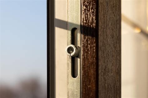 Premium Photo Closeup Detail Of The Locking Mechanism Of A Plastic Window