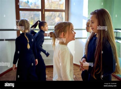 Group Of Pre Teens Perform A Teachers Task During An Acting Class