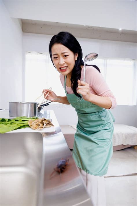 Shocked To See A Cockroach In The Kitchen Stock Image Image Of Beautiful Casual 299912713