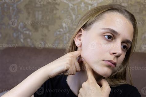 Girl Massages Her Face To Smooth Out Wrinkles And Improve Skin Health