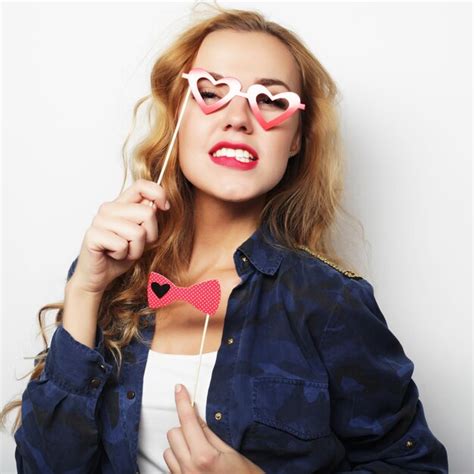 Premium Photo Party Image Playful Young Woman Holding A Party Glasses