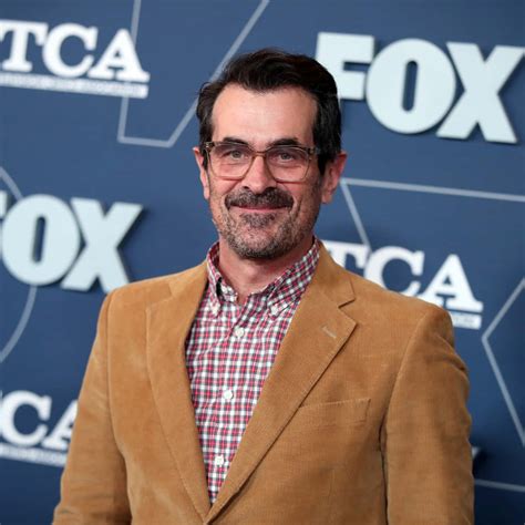 Download Ty Burrell Smiling Elegantly Wallpaper