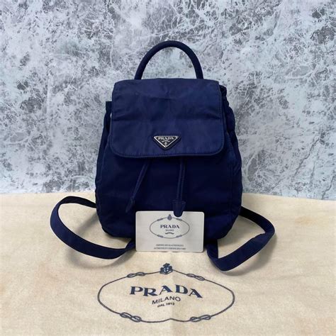 Prada プラダ ミニリュック リュックサック ナイロン ネイビー 三角ロゴ メルカリ