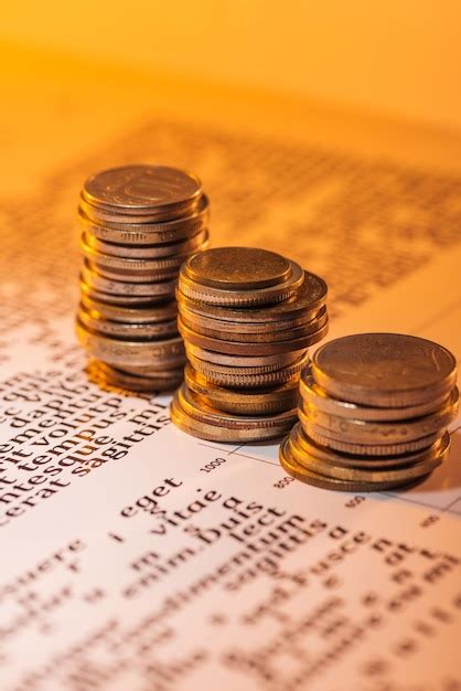 Premium Photo Selective Focus Of Business Text Document With Coins Stacks