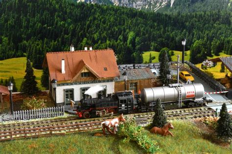 Miniature Railway Model With Model Steam Locomotive Train At Station On