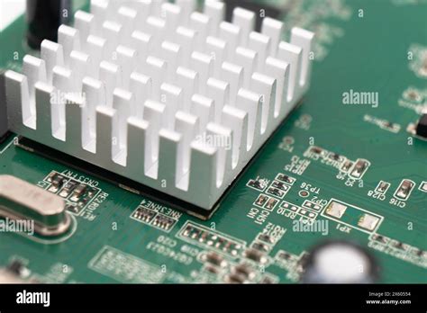 Macro Shot Of Circuit Board With Resistors Microchips And Electronic Components Background