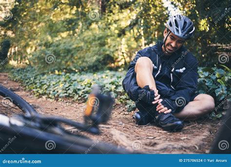 Man Cycling Leg Injury And Pain Outdoor On Mountain Bike Or Bicycle In