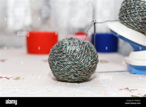 The Process Of Winding Wool Green Yarn From Tangle To Winding Using A