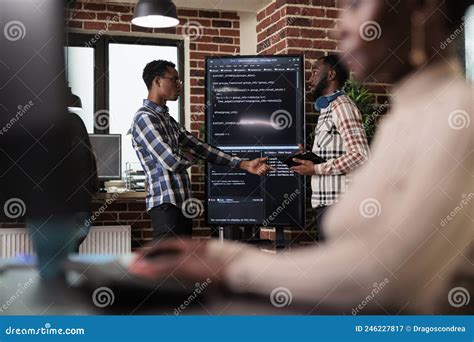 African American Software Developers Pointing Out Cloud Database Processing Algorithm Error
