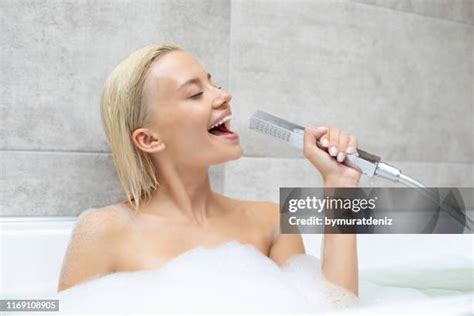 Woman Sing Shower Photos And Premium High Res Pictures Getty Images