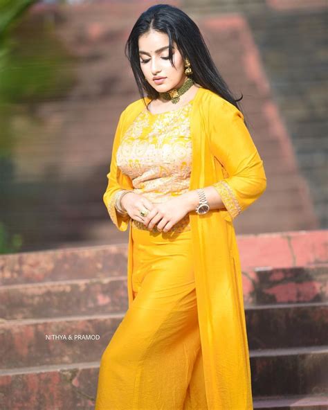 Actress Model Malavika Menons Gorgeous Look In Yellow Outfit Made