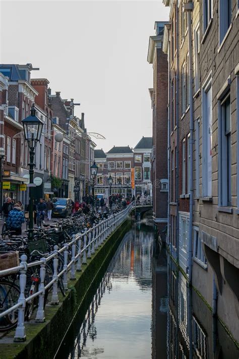 City Center Of Delft Netherlands With The Traditional Canals And Bikes