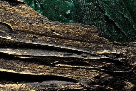 Premium Photo Decorative Black Gold Green Putty Background Wall
