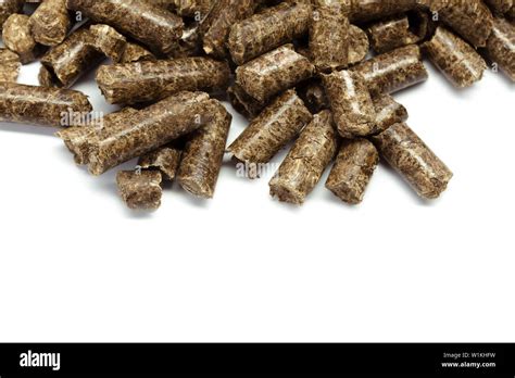 Stack Of Wooden Pellets For Bio Energy White Background Isolated