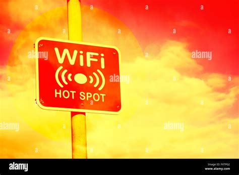 Wifi Hotspot Sign Against A Hot Red And Yellow Background Stock Photo Alamy